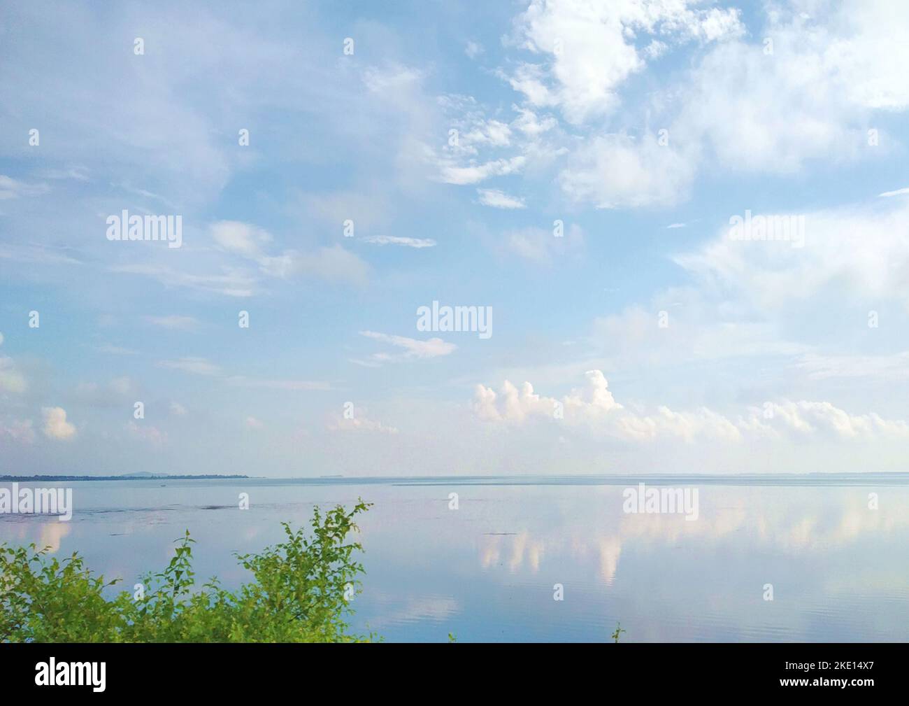 The beautiful view of the sky reflecting on a lake Stock Photo - Alamy