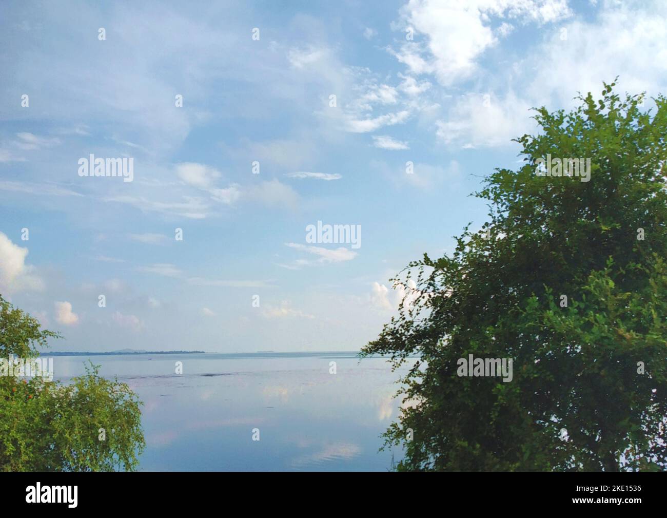 The beautiful view of the sky reflecting on a lake Stock Photo - Alamy