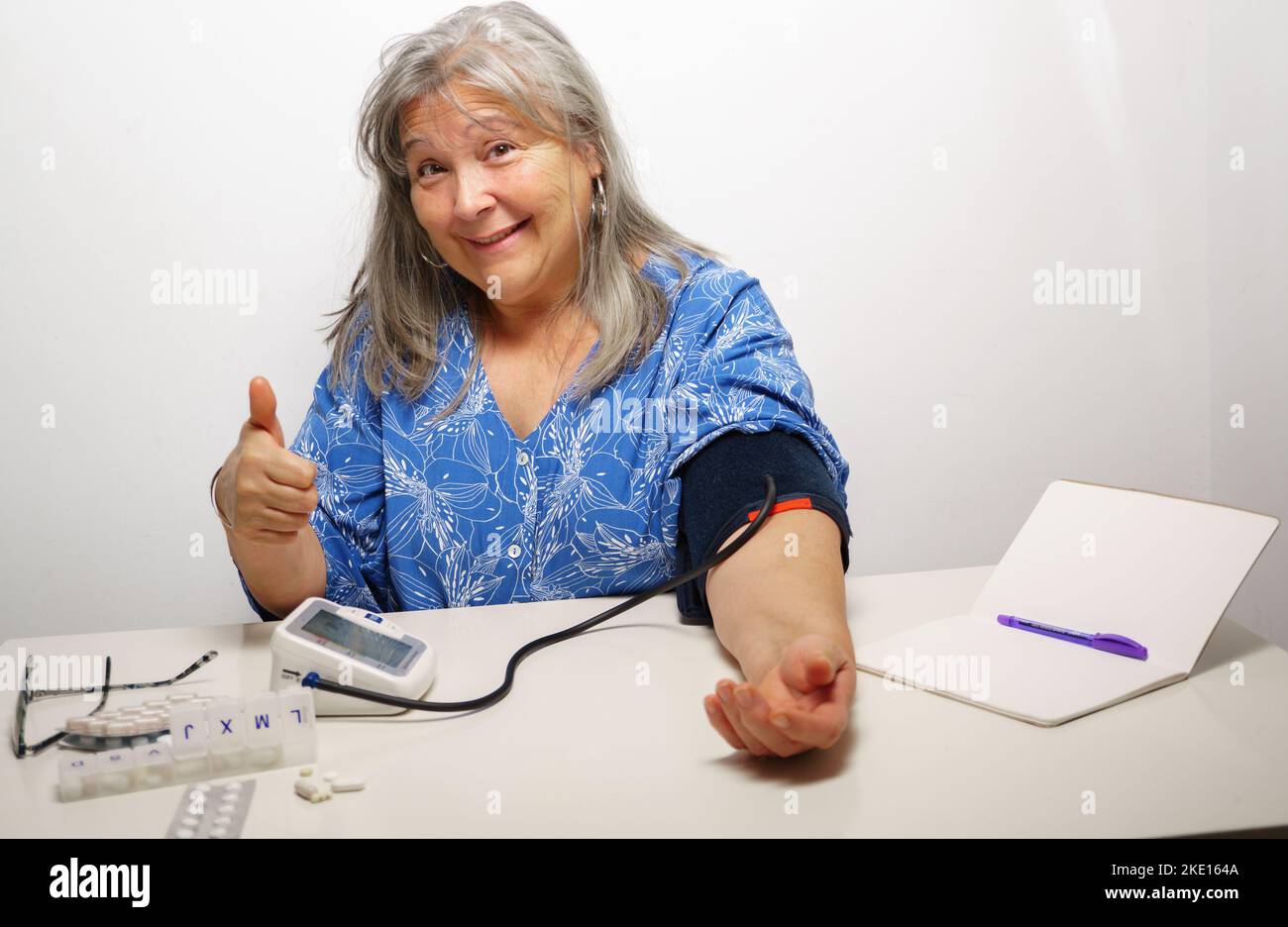 woman taking her tension with a nod of approval Stock Photo - Alamy