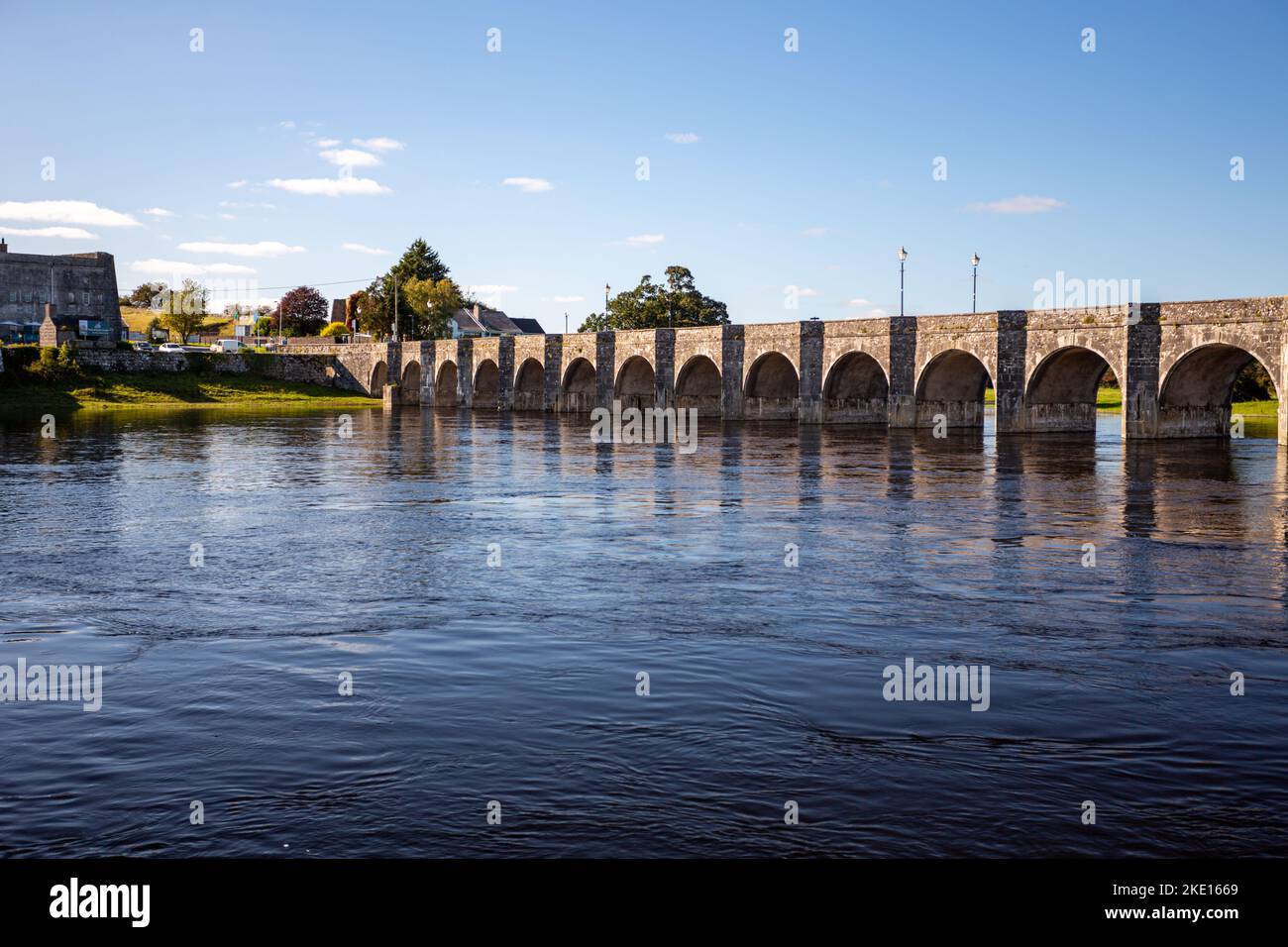 A beautiful shot of a stone arcade bridge on River Shannon in Ireland ...