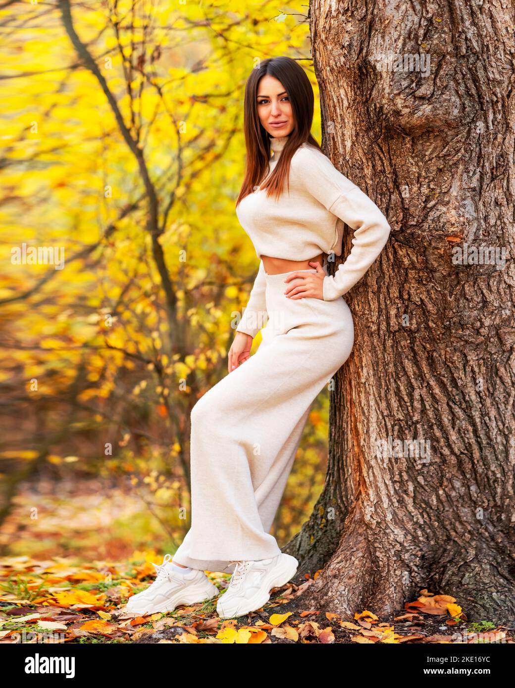 Beautiful girl walking outdoors dress hi-res stock photography and ...