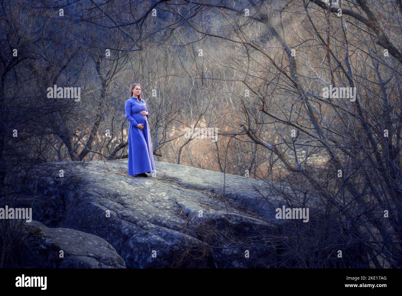 The rays of the sun shine on a pregnant woman Stock Photo - Alamy