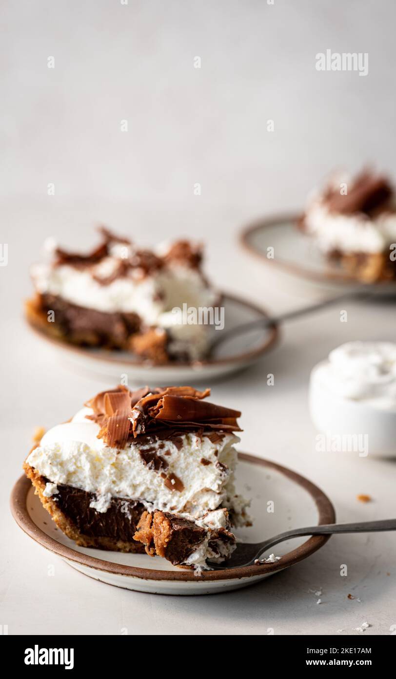Three slices of chocolate pie and whipped cream Stock Photo - Alamy
