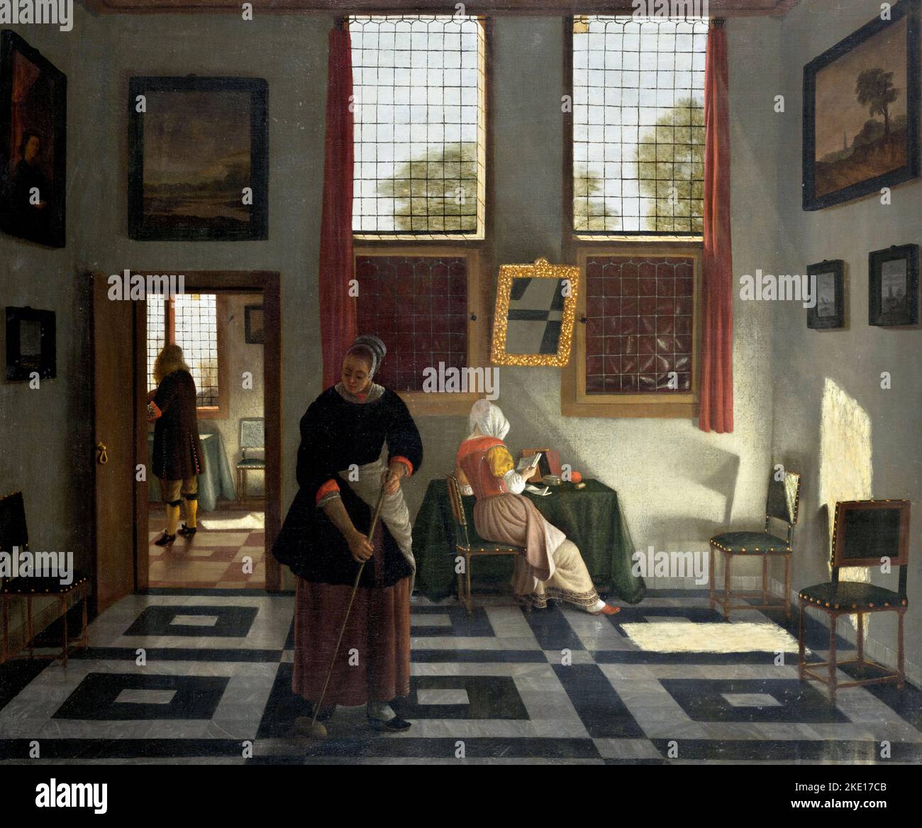 Woman reading and maid sweeping hi-res stock photography and images - Alamy