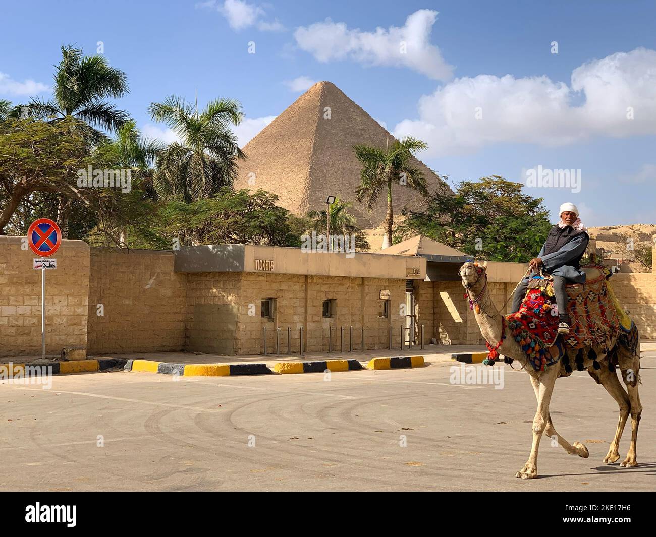 A camel rider in front of a Pyramid entrance in Giza, Cairo, Egypt ...