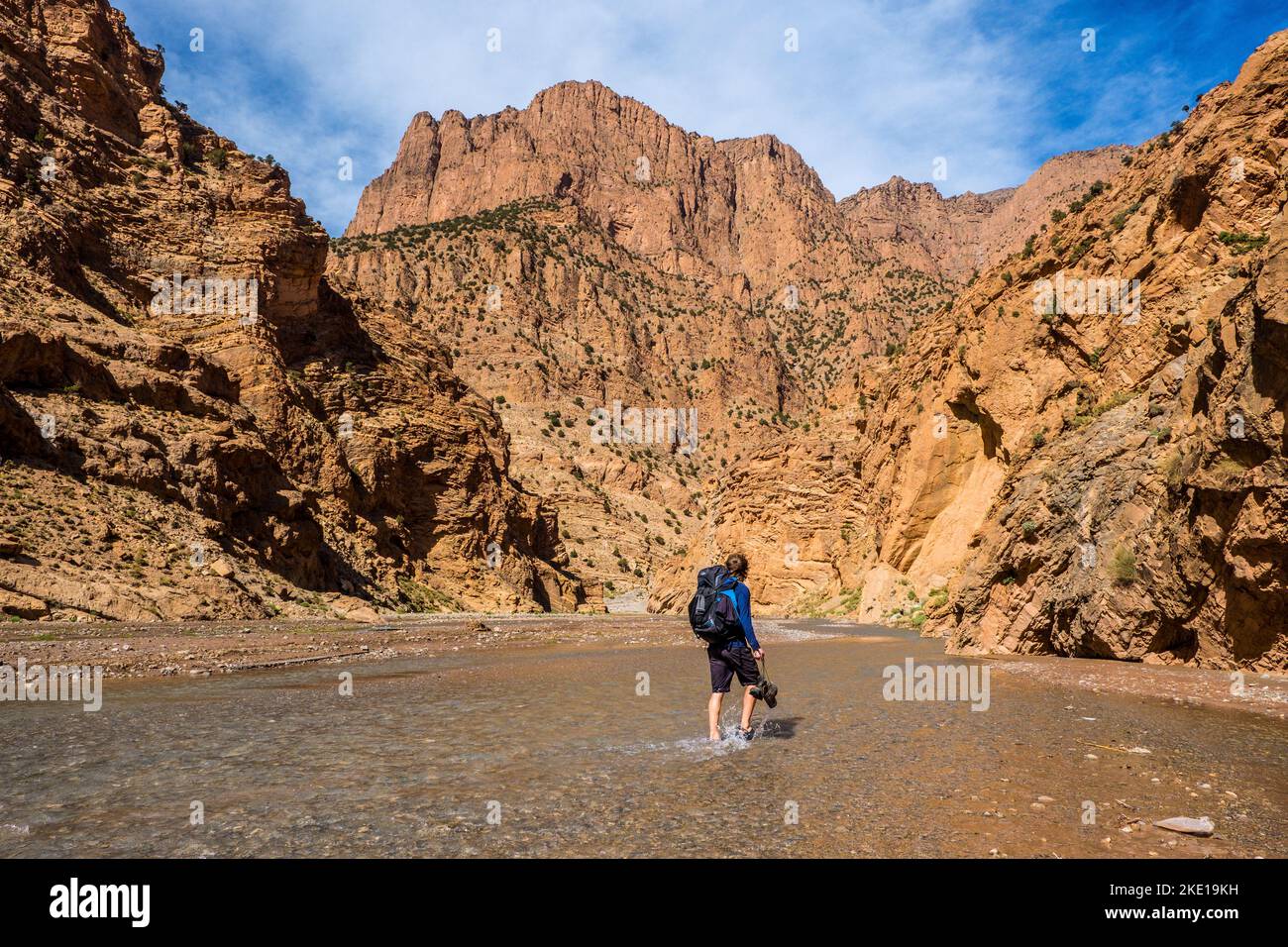 Male walker Trekking the M'Goun gorges / river trek in the High Atlas ...