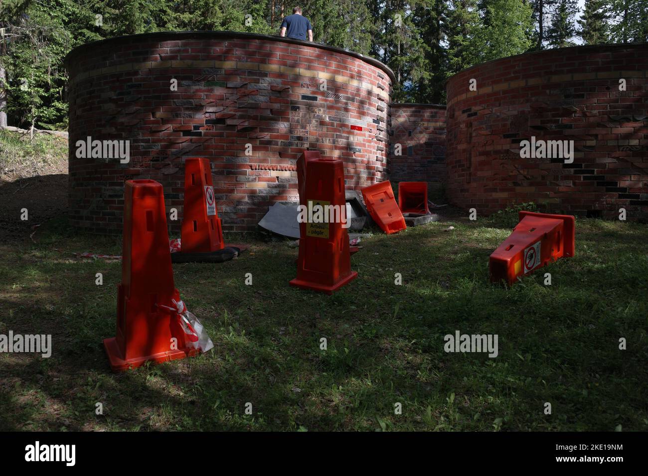 An abandoned, red parking posts in the nature Stock Photo - Alamy