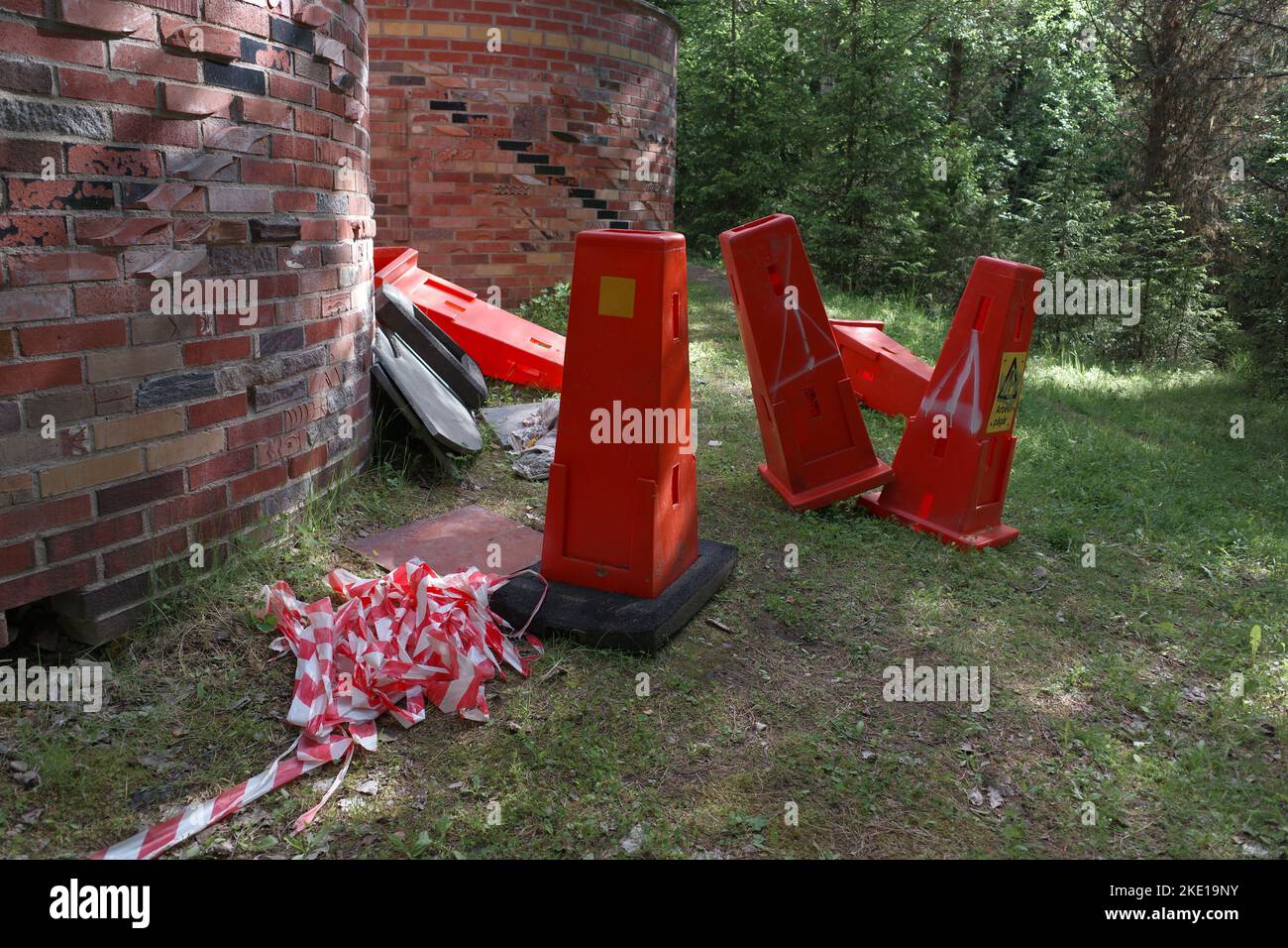 An abandoned, red parking posts in the nature Stock Photo - Alamy