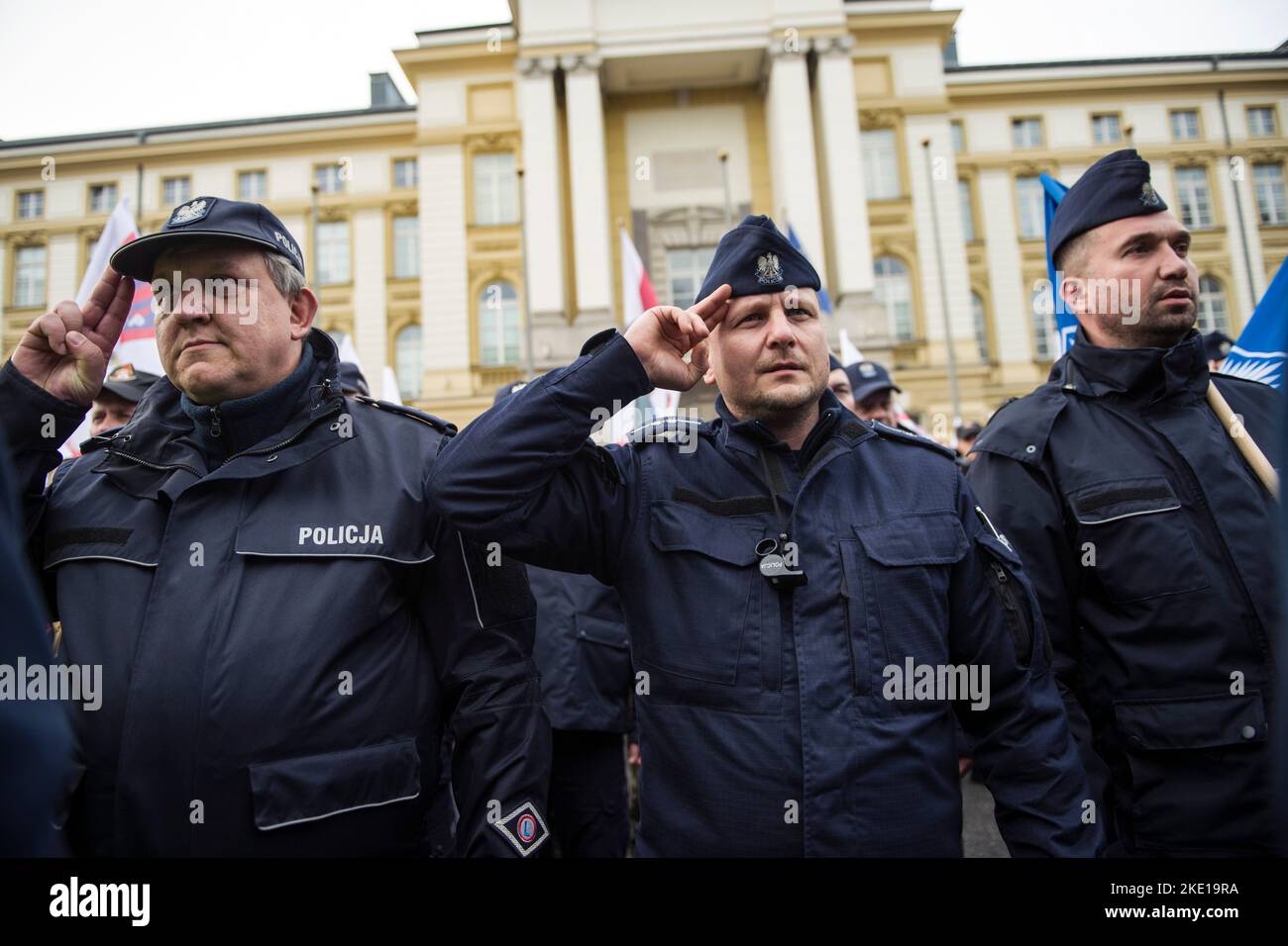 Policemen are seen saluting during the Polish uniformed services ...