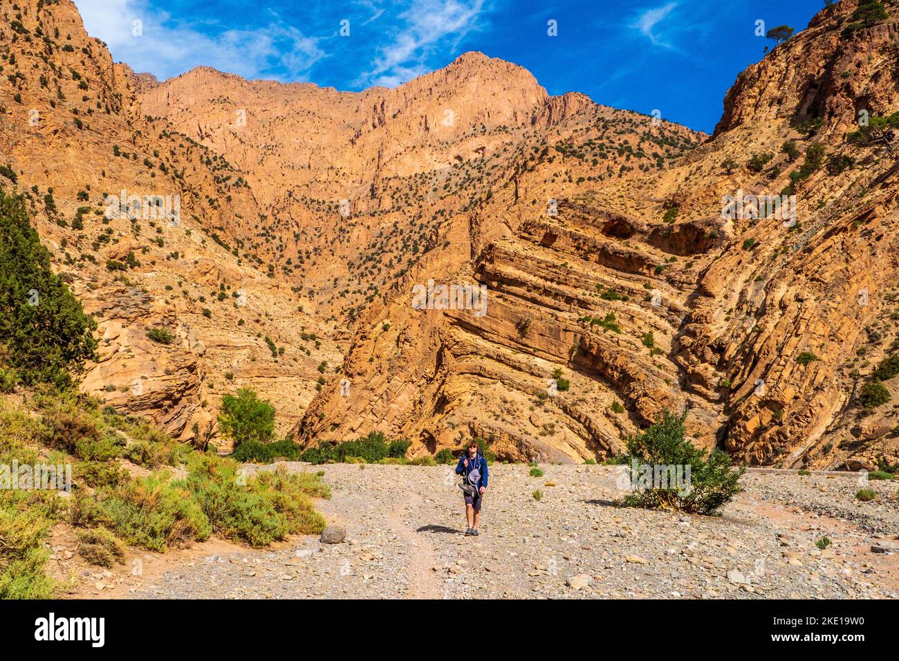 Male walker Trekking the M'Goun gorges / river trek in the High Atlas ...