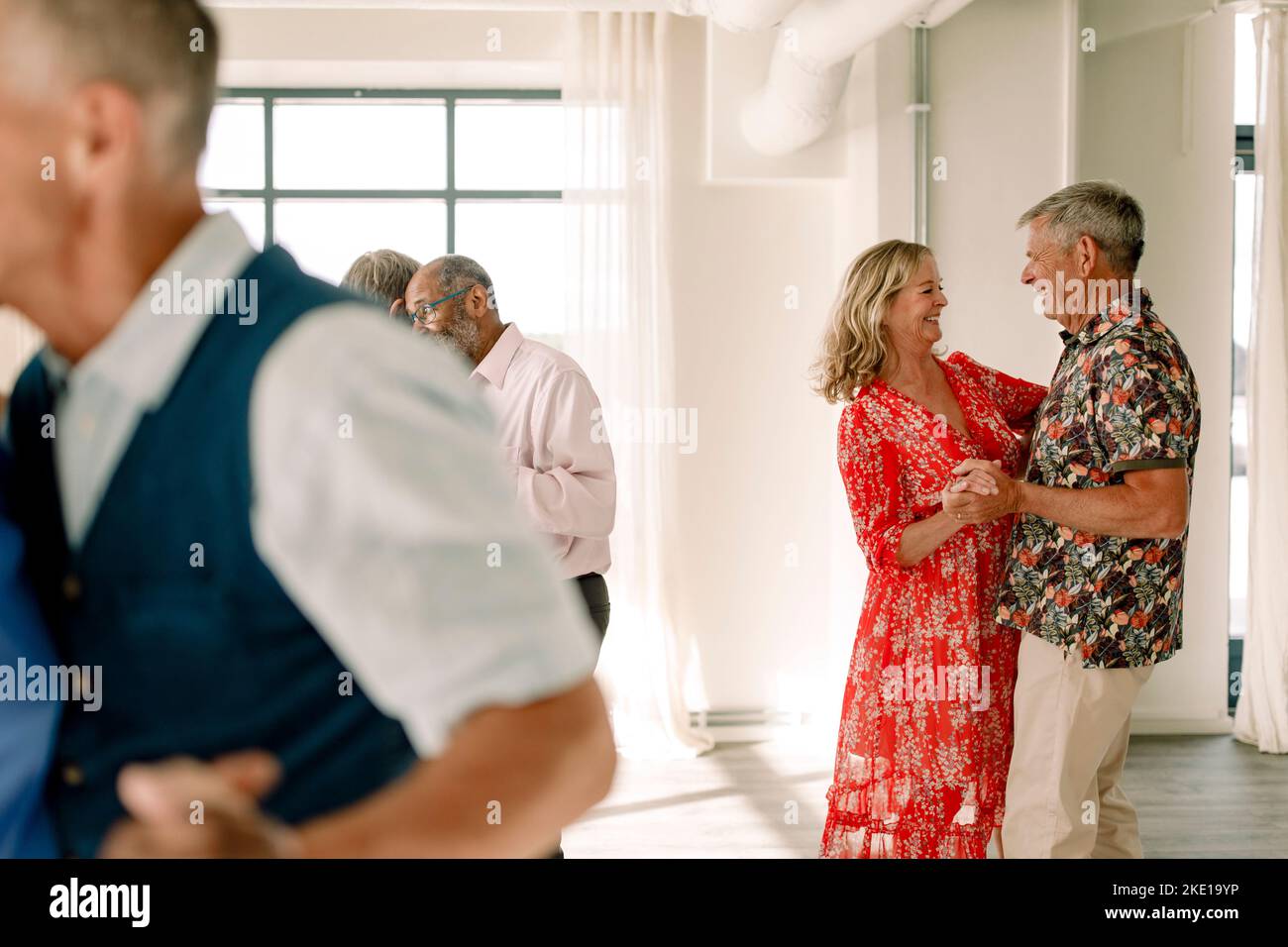 Dancing enjoyment smiling holding hands hi-res stock photography and ...
