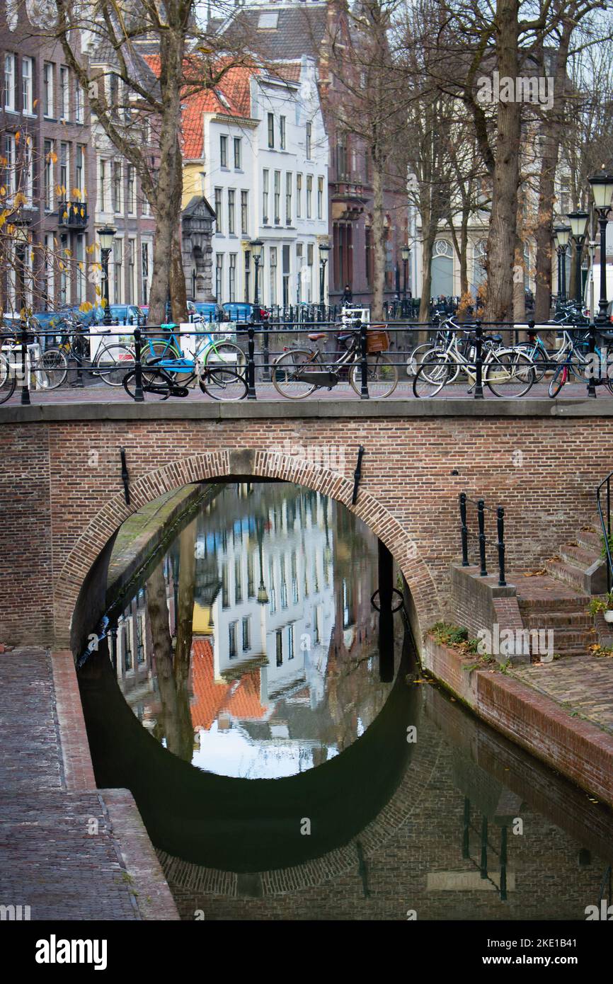 Bridge with bicycles over a canal in the historic city centre of ...