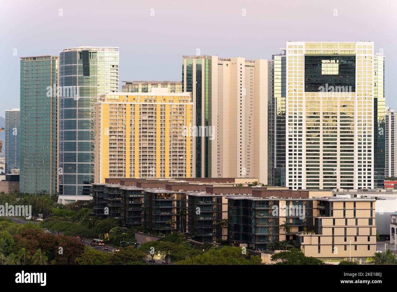 A newly constructed high rise buildings with a blue sky on the horizon ...