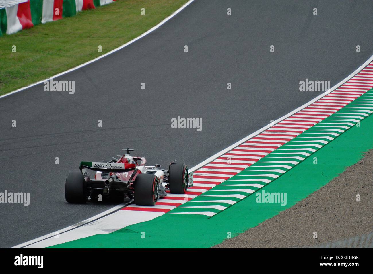 Zhou Guanyu driving his Alfa Romeo through Suzuka Circuit Stock Photo ...