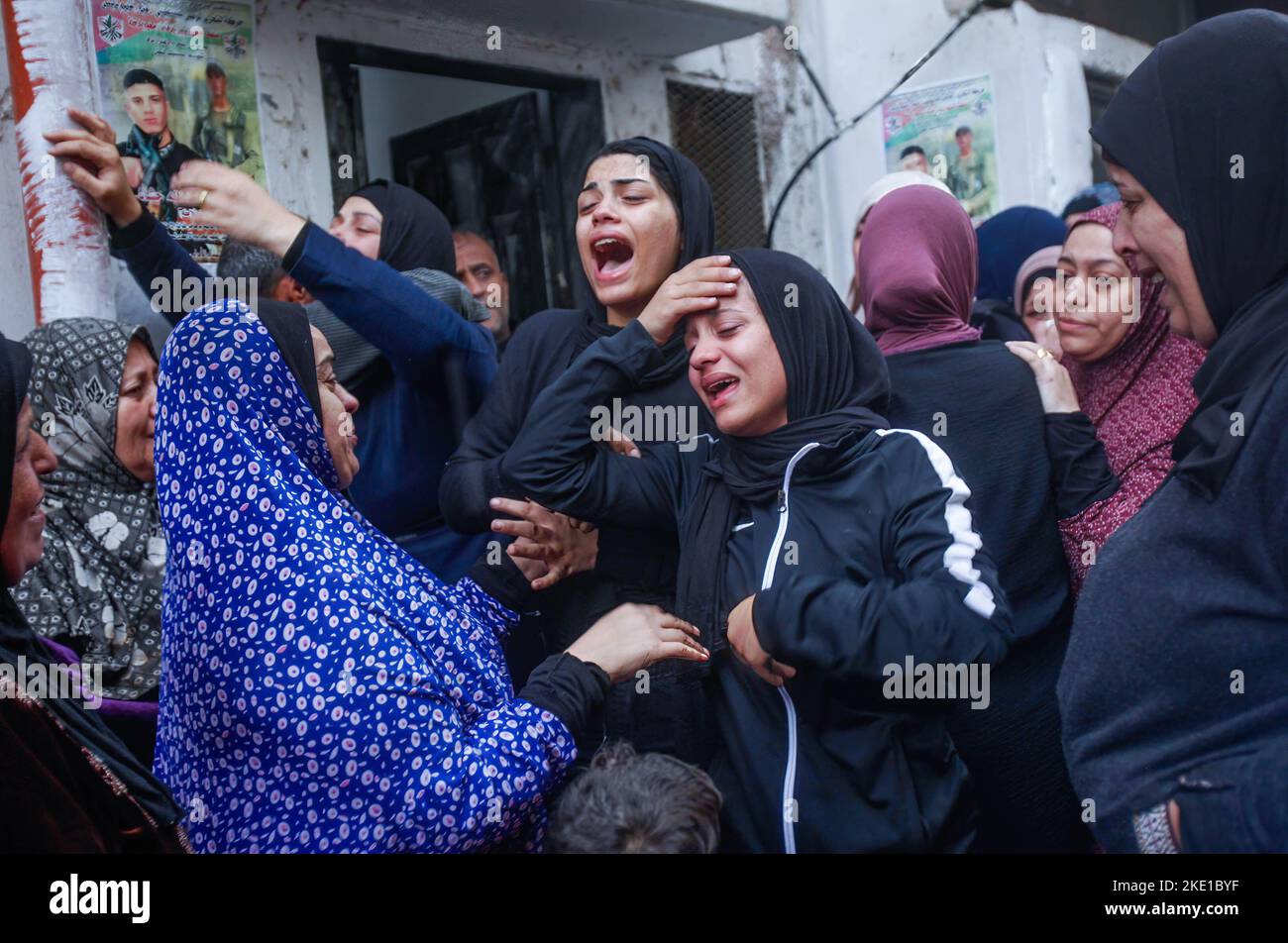 Nablus, Palestine. 09th Nov, 2022. Relatives mourn during the funeral ...