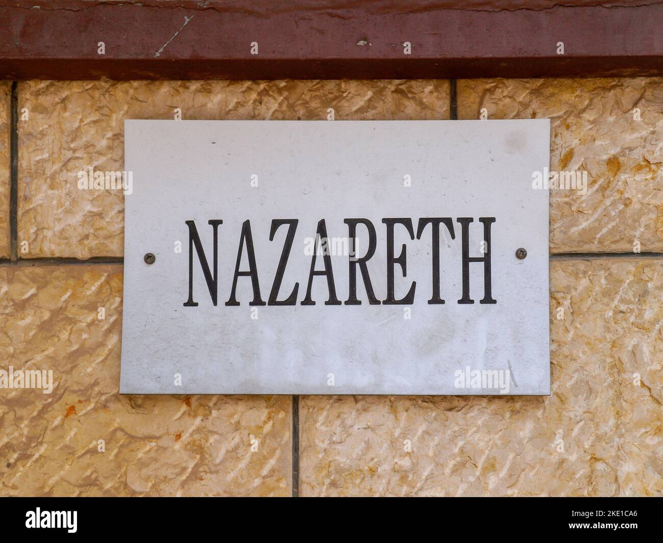 Nazareth sign with black letters on a dirty white board, mounted on a ...