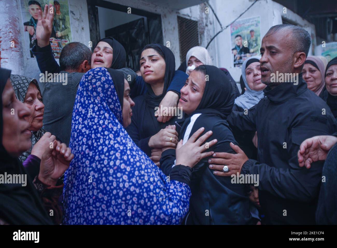 Relatives mourn during the funeral of the Palestinian teenager Majdi ...