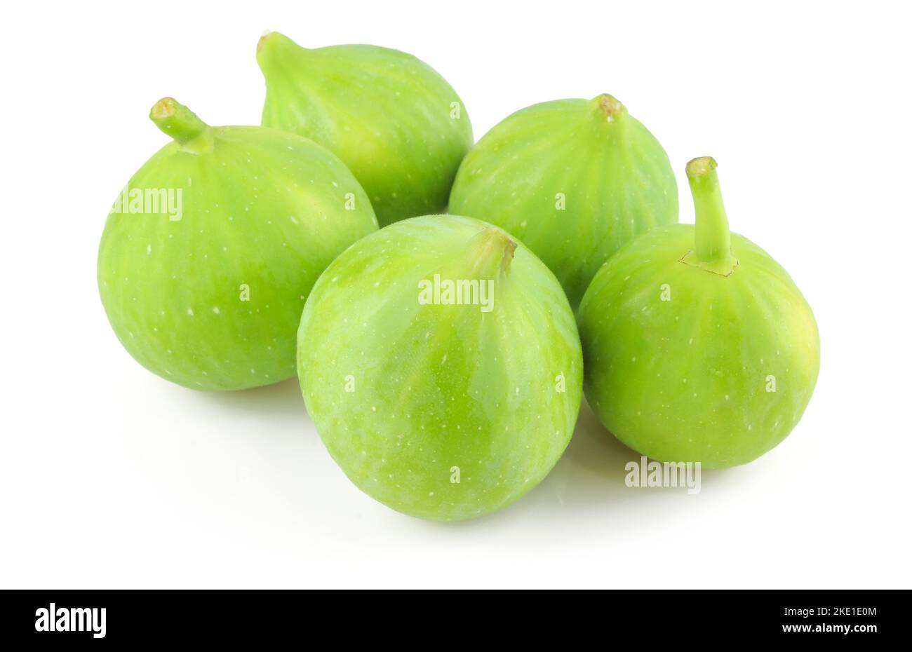 Group of green figs isolated on white background Stock Photo - Alamy