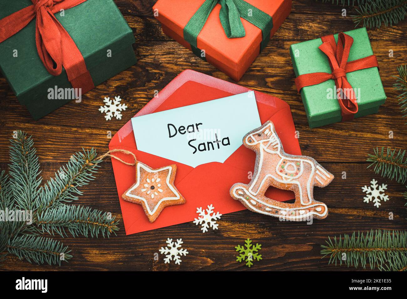 Baby letter to Santa Claus, red envelope with a postcard with ...