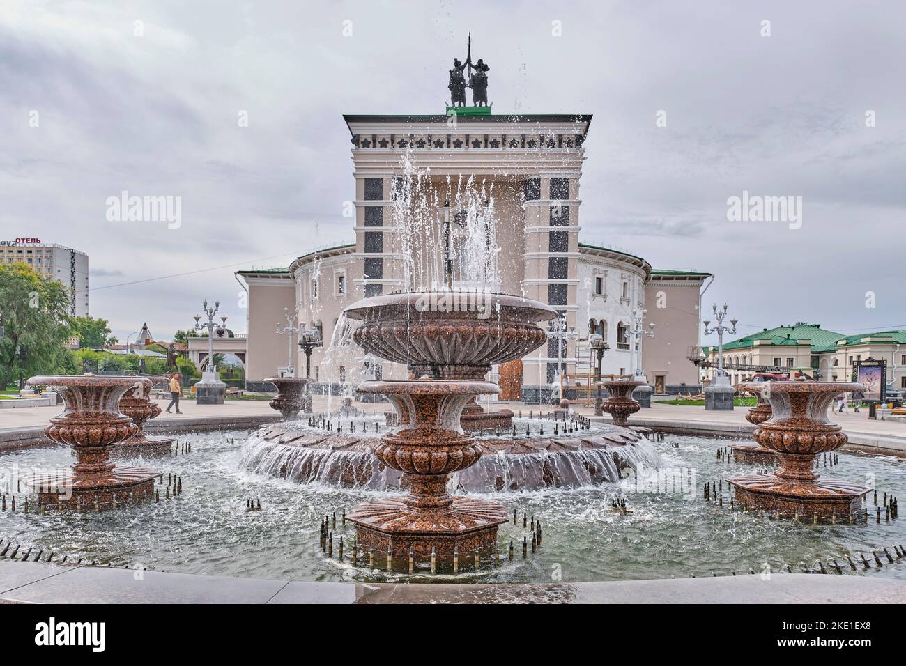 Close-up color music fountain on Theater Square. Buryat Opera and ...