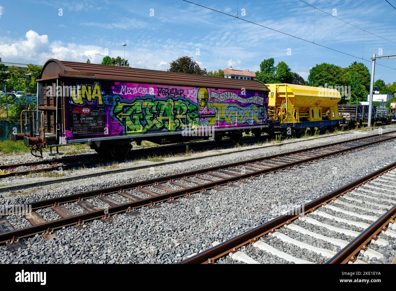 A train wagon with graffiti art on a sunny day Stock Photo - Alamy