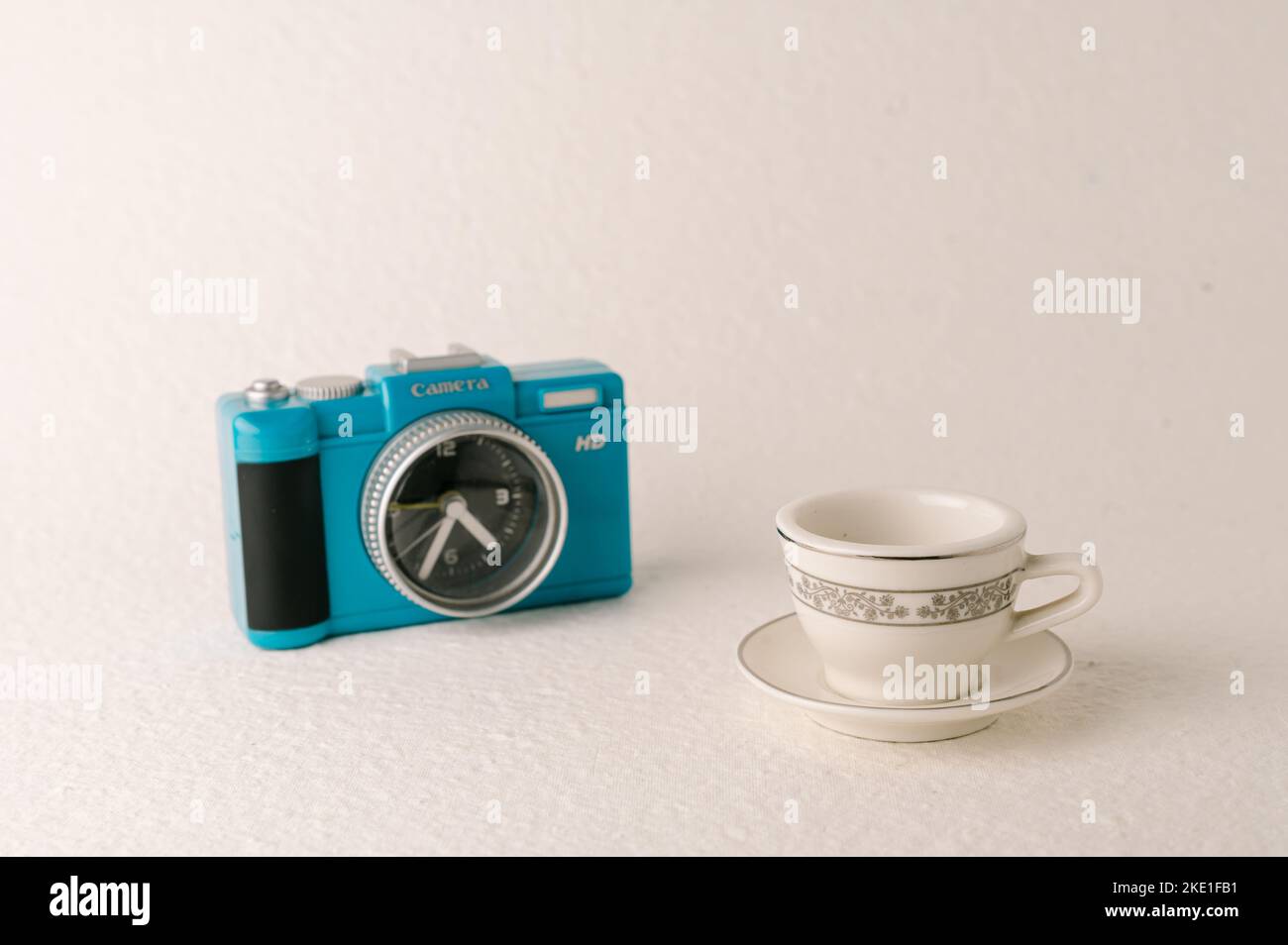 cup of coffee with clock on white background Stock Photo - Alamy