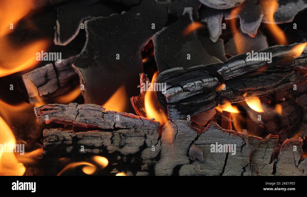 Firing wood and ash close-up. Grill preparation outside Stock Photo - Alamy
