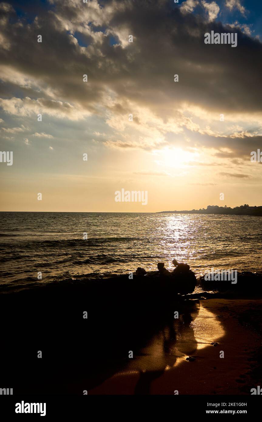 Most beautiful sunset of the beach with the setting sun Stock Photo - Alamy