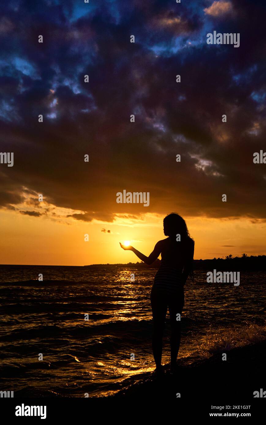 Most beautiful sunset of the beach with the setting sun Stock Photo - Alamy