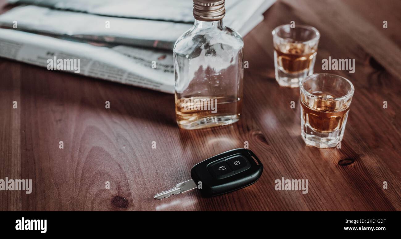 Do not drink and drive concept, Close up of car keys and glass of ...