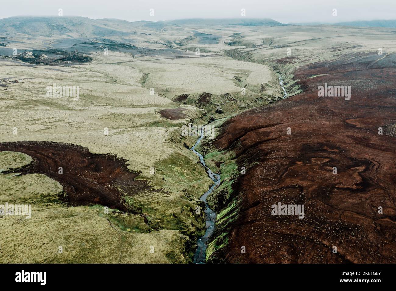 An aerial shot of green-covered mounts in the Katla Geopark, Iceland ...