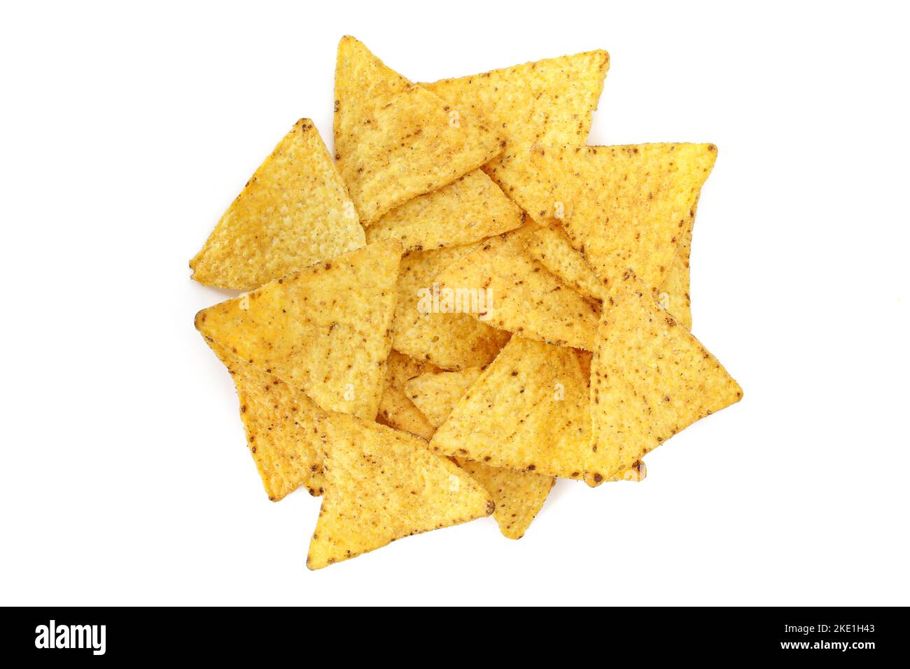 Pile of triangle shaped tortilla corn chips isolated on white ...
