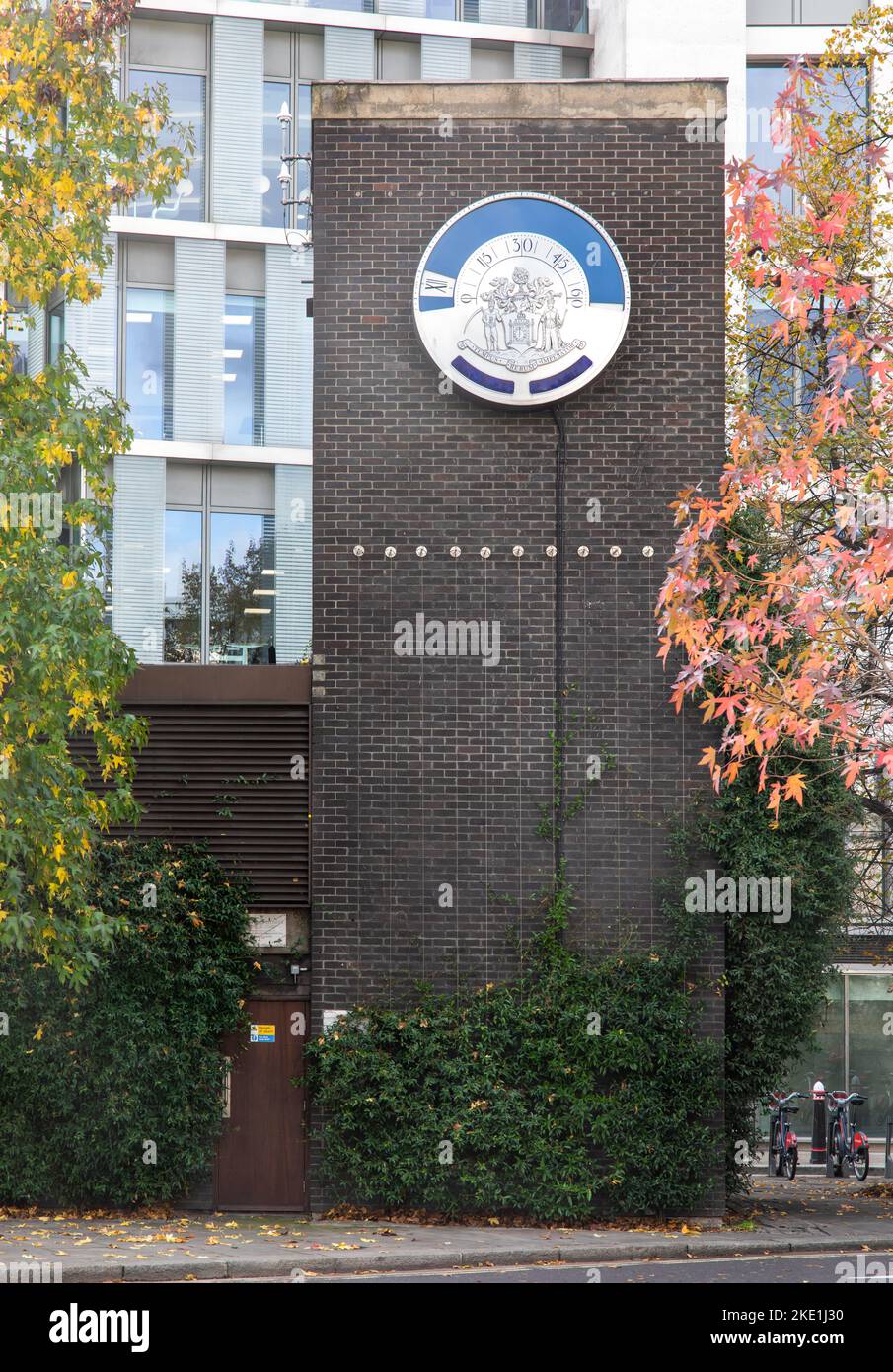A vertical shot of the Newgate Street Clock installed in 2007 on black ...