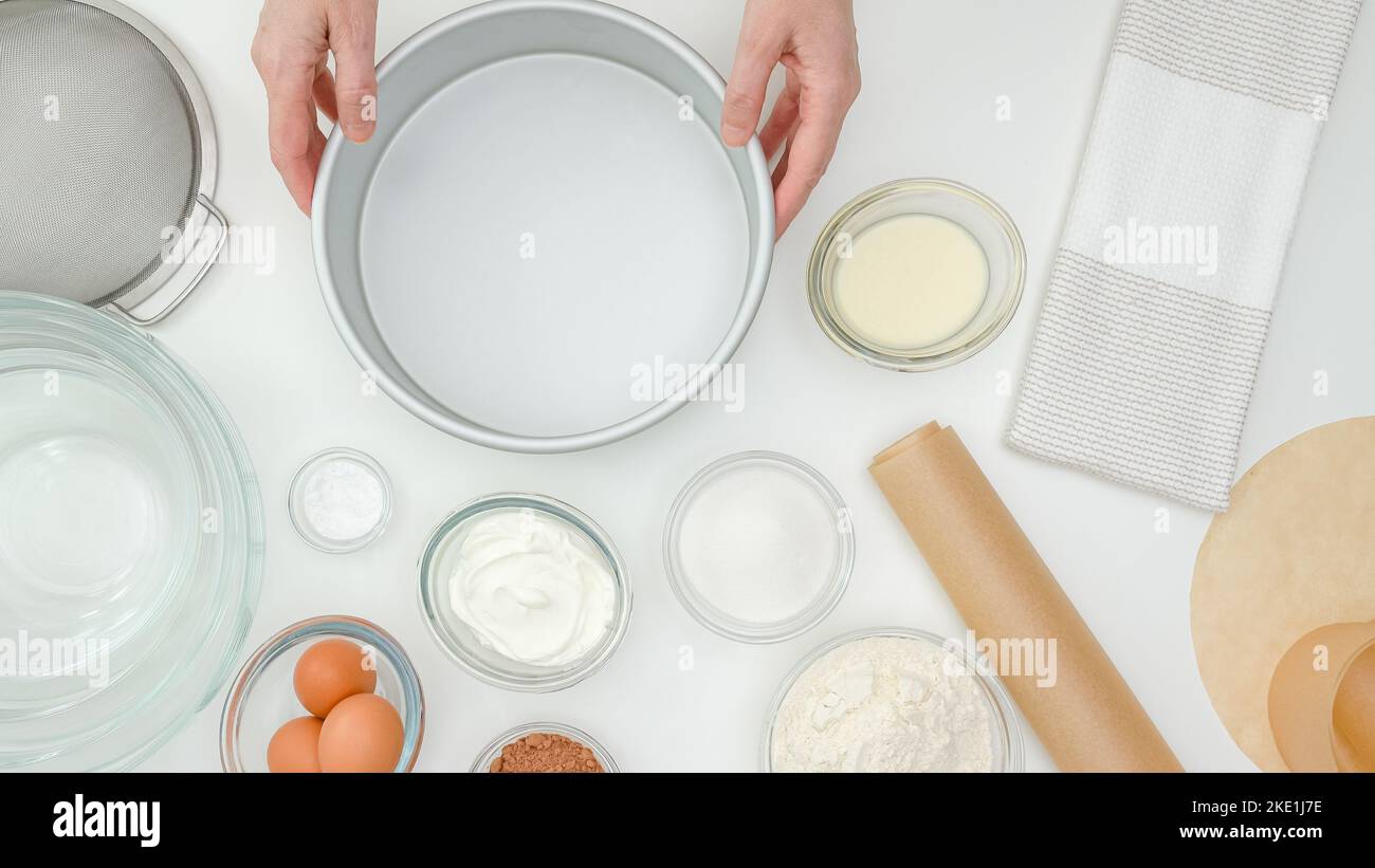 Ingredients, dishes, parchment paper close up on kitchen table, view ...