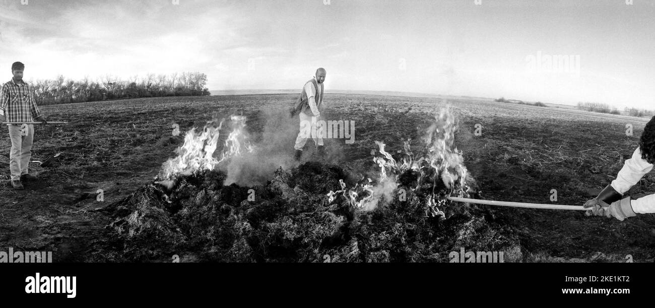 Master Potter Richard Bresnahan (center) along with apprentices burning ...