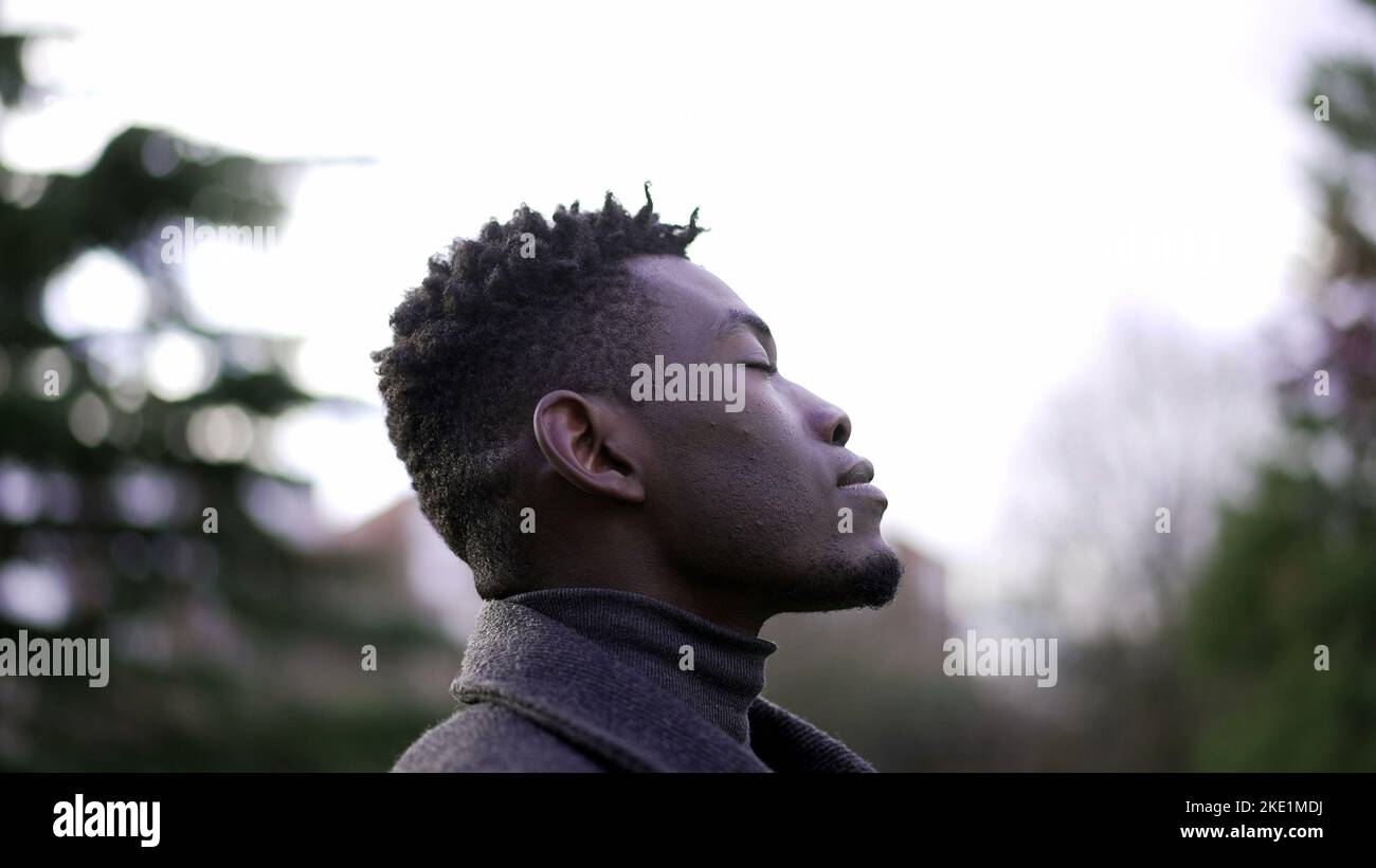 African man taking deep hi-res stock photography and images - Alamy