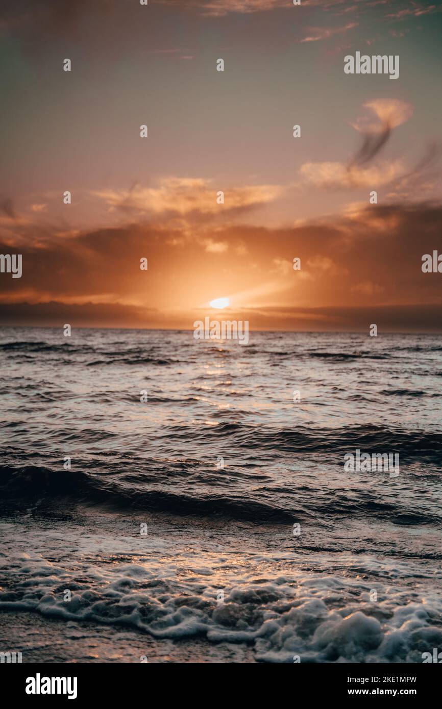 The beautiful sunset in the dramatic sky in Baltic sea, Latvia ...