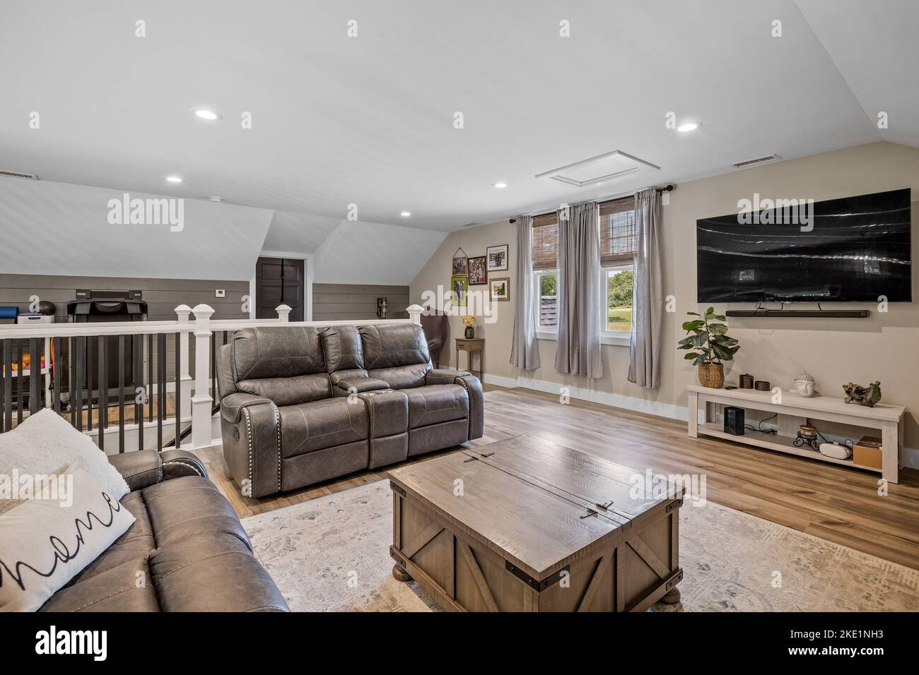 The beautiful interior design of a second floor lounge area in a modern ...