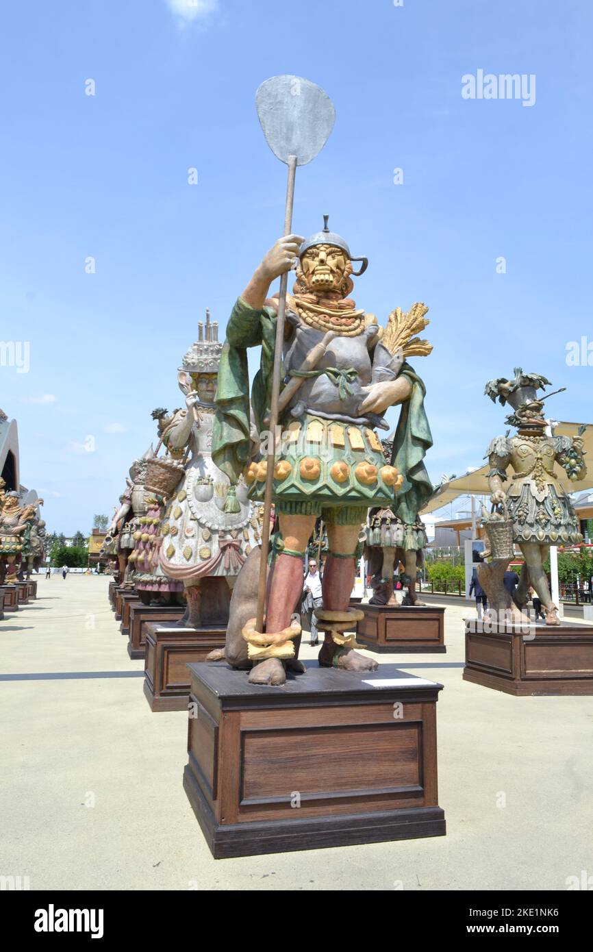 Statue of Fornaro - baker standing in a group of statues of The Food ...