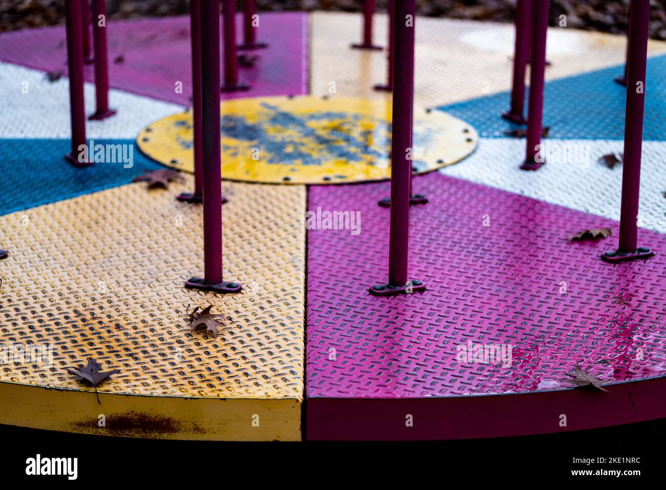 A closeup on the floor of merry go round with abstract colors and fall ...