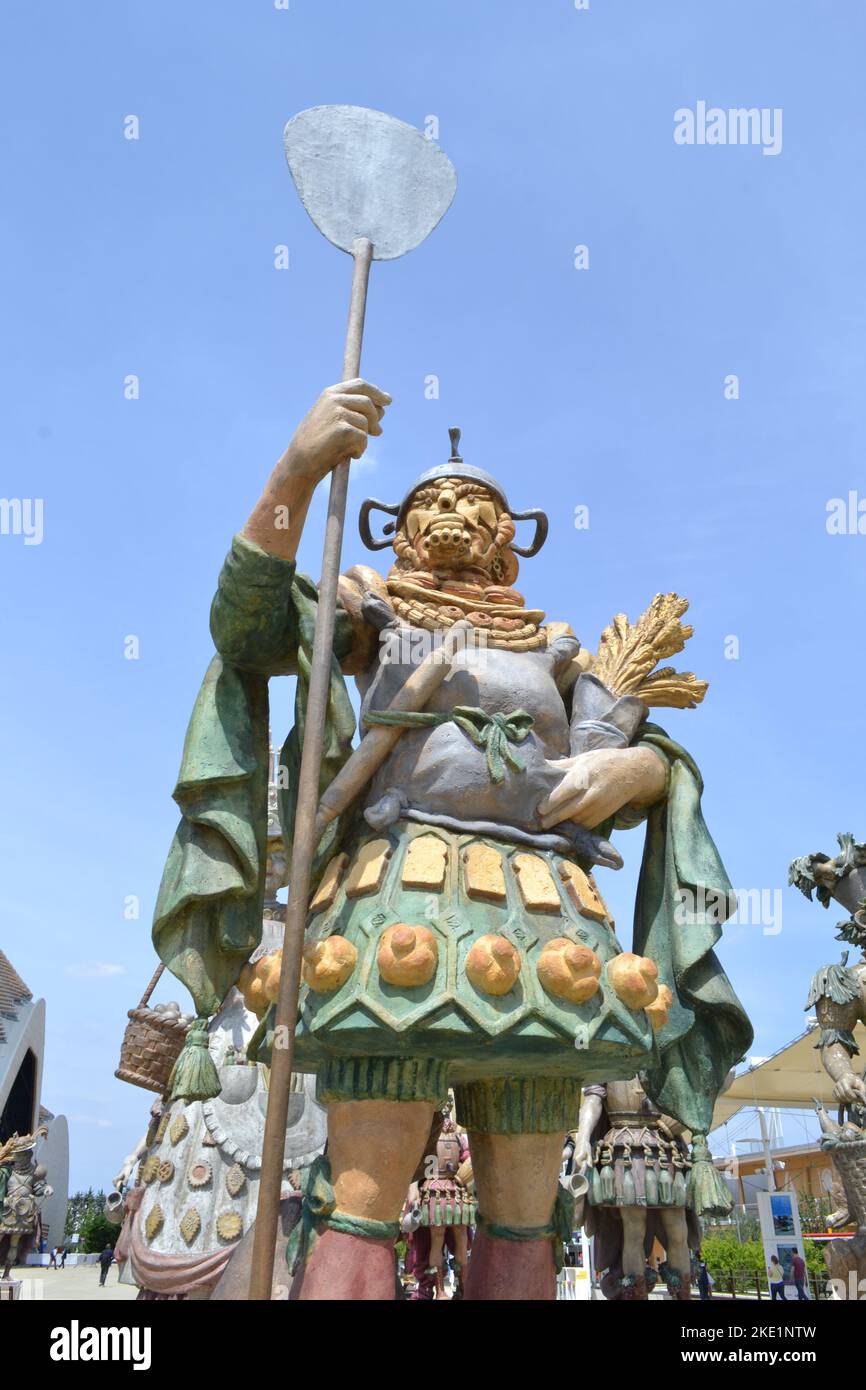 Statue of Fornaro - baker standing in a group of statues of The Food ...