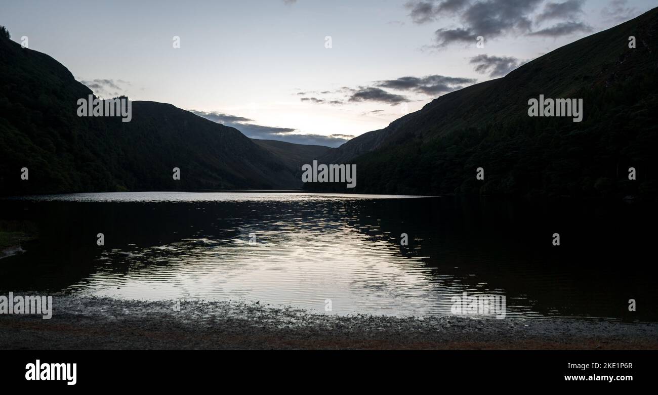 Glendalough lake in a cloud day, Ireland Stock Photo - Alamy