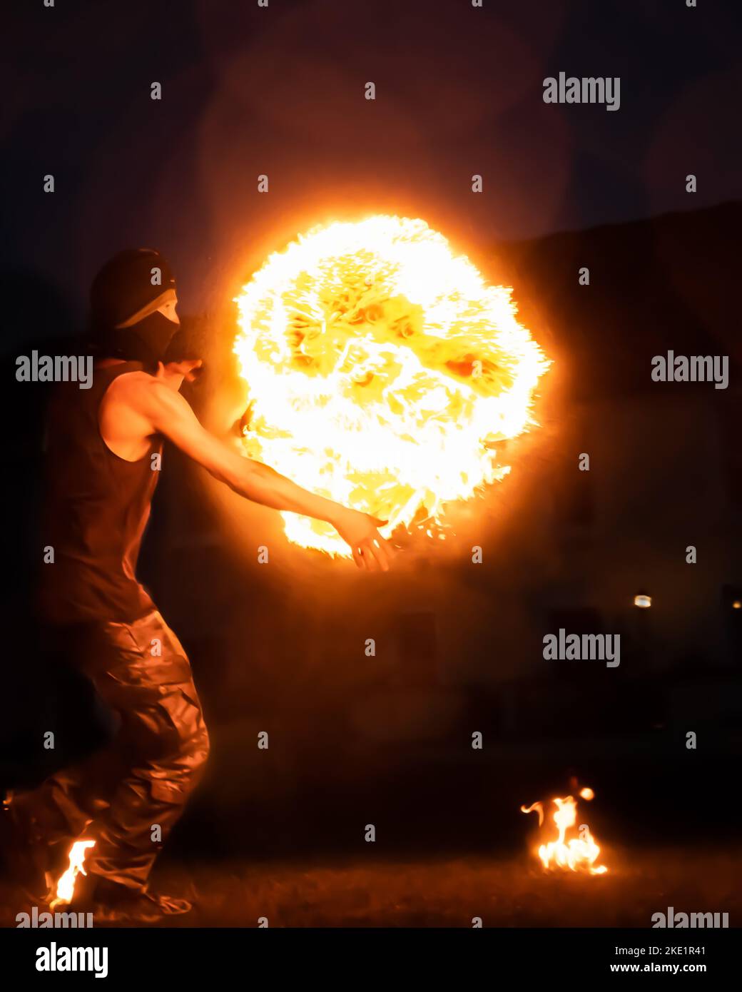 A fire breather breathing huge flames Stock Photo - Alamy