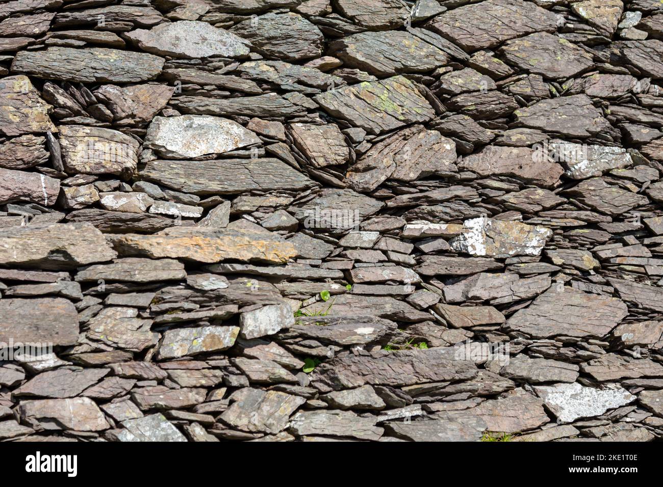 A grey stone wall background structure Stock Photo - Alamy