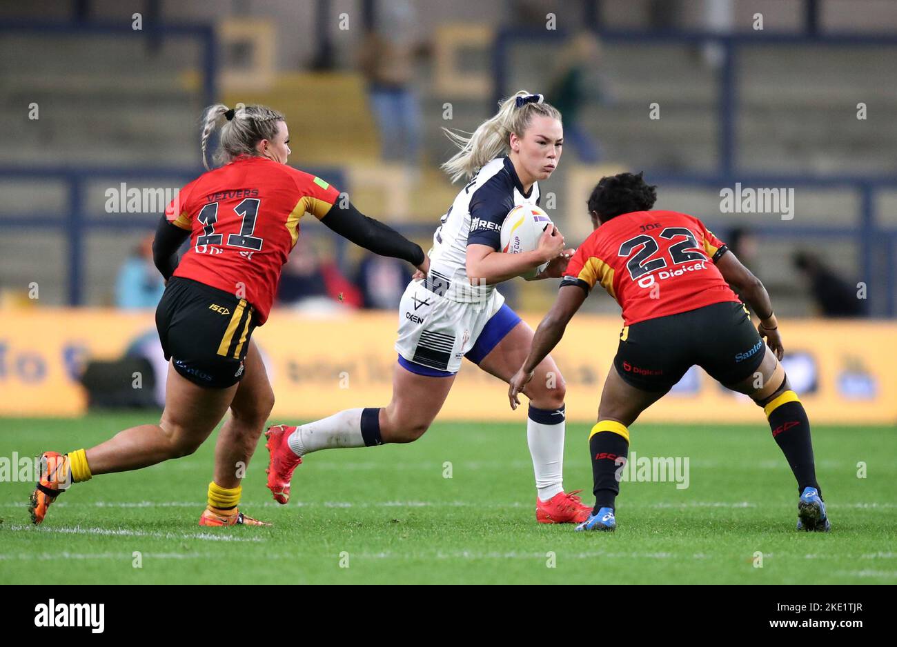 England's Hollie Dodd carries the ball during the Women's Rugby League ...