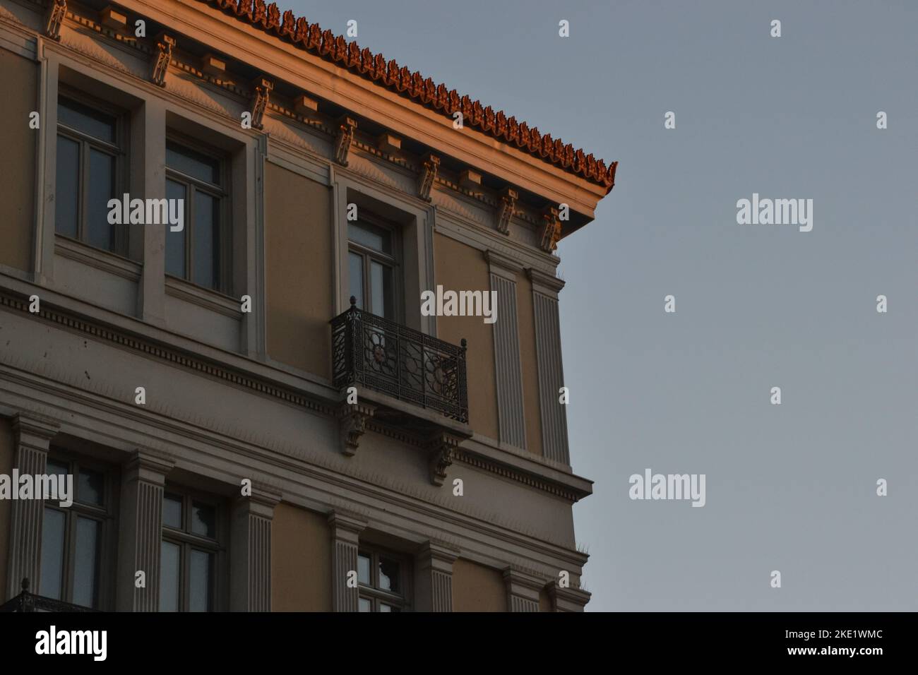 A low angle of sunset light on an architectural building in Athens ...