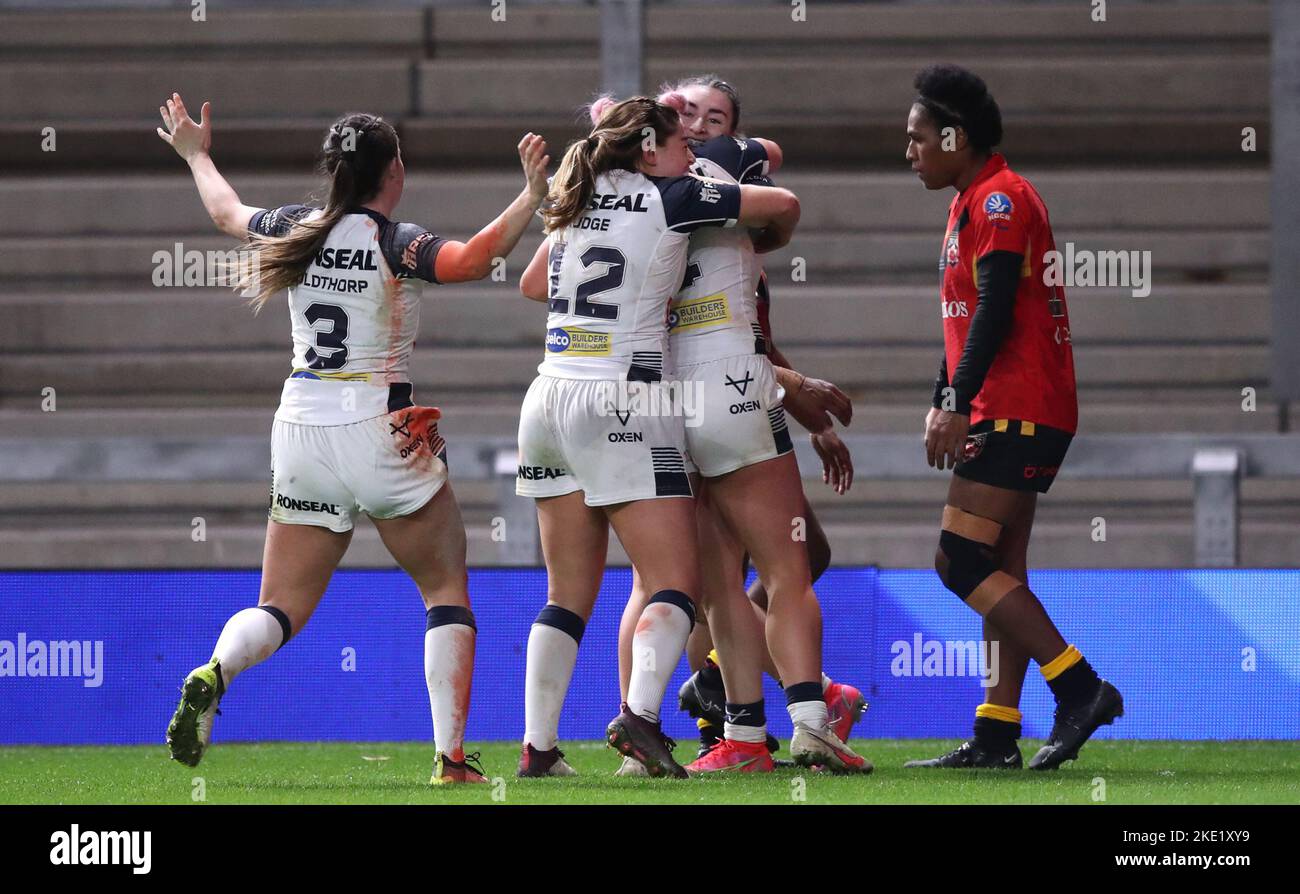 England's Leah Burke celebrates scoring a try during the Women's Rugby ...