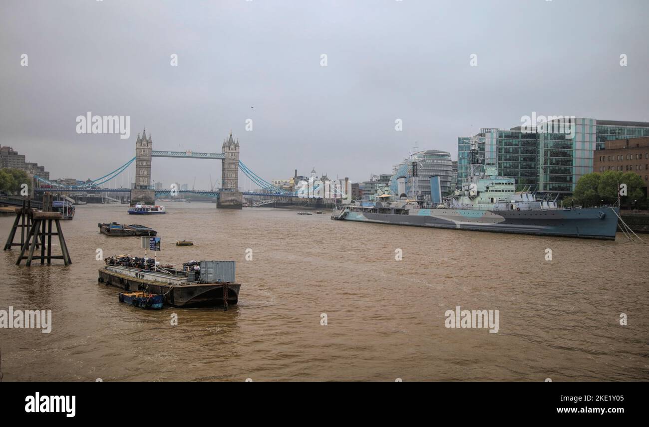 A beautiful view of the river Thames and Tower bridge on a foggy cloudy ...