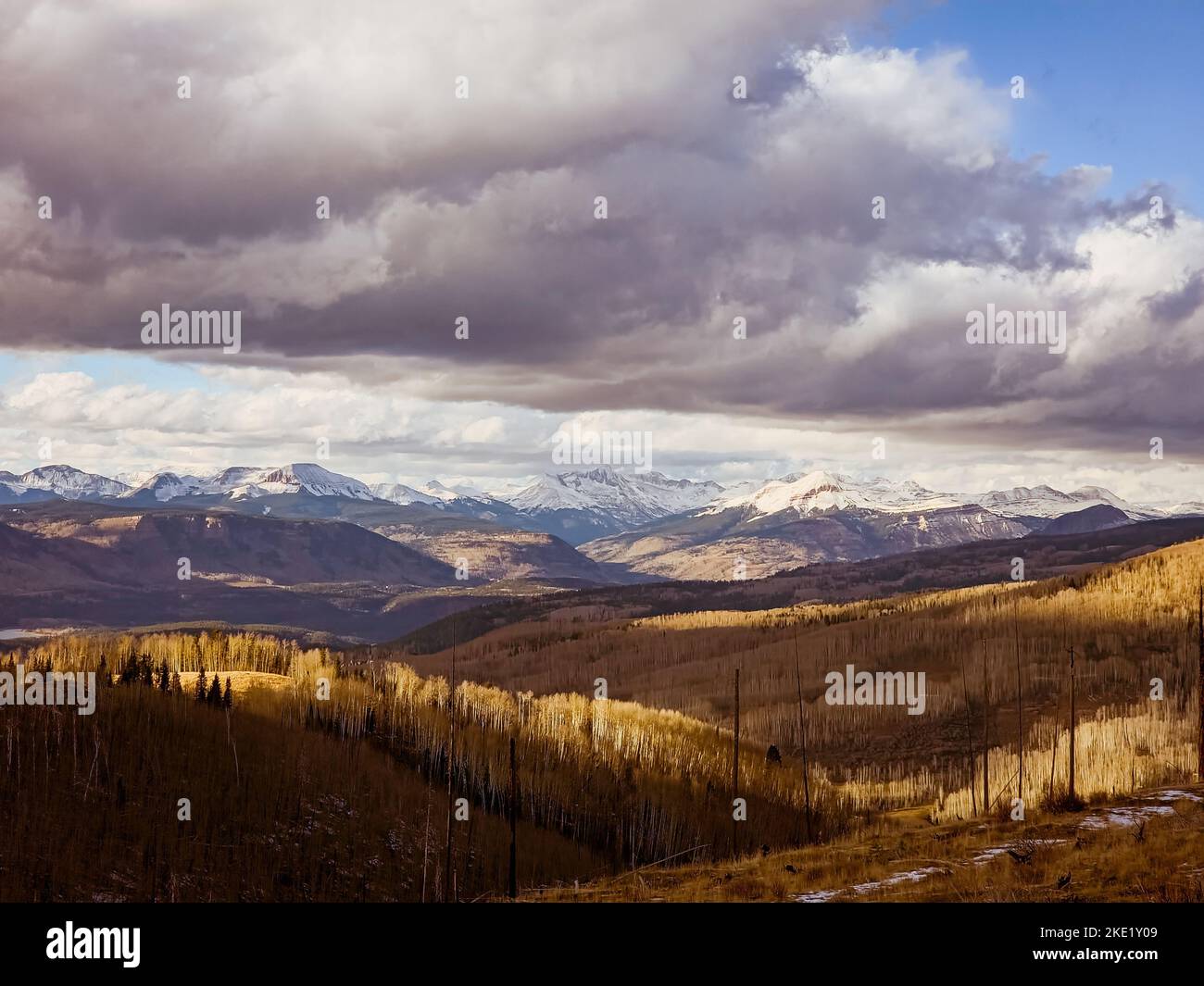 A stunning view of the Rocky Mountains of Colorado under a cloudy sky ...