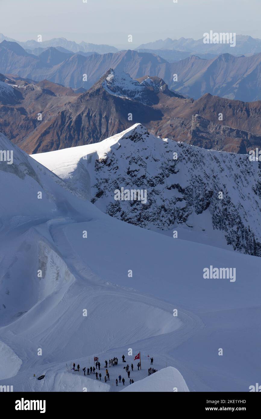 The vertical view of snow-covered slopes of mountains in Jungfrau ...